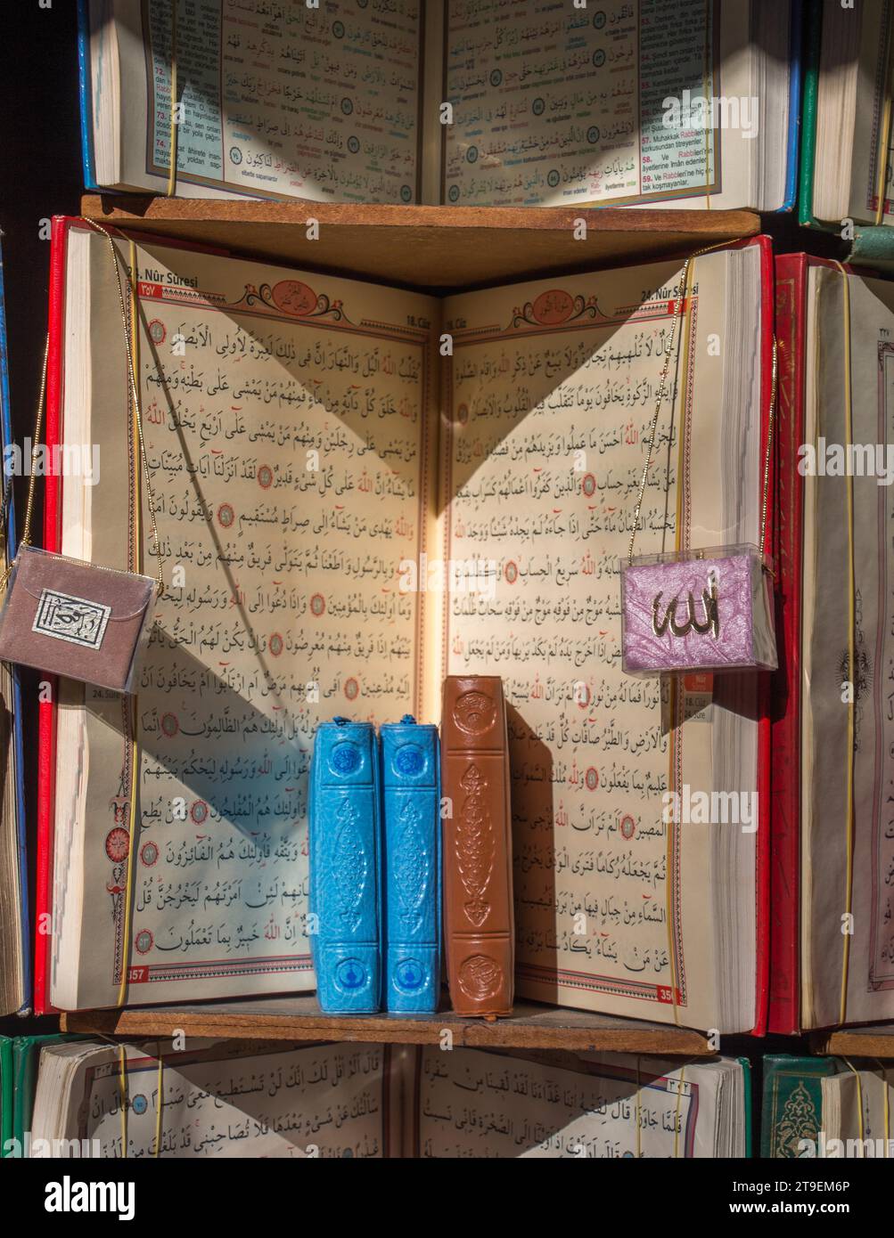 Islamic Holy Book Quran on the market shelf Stock Photo - Alamy