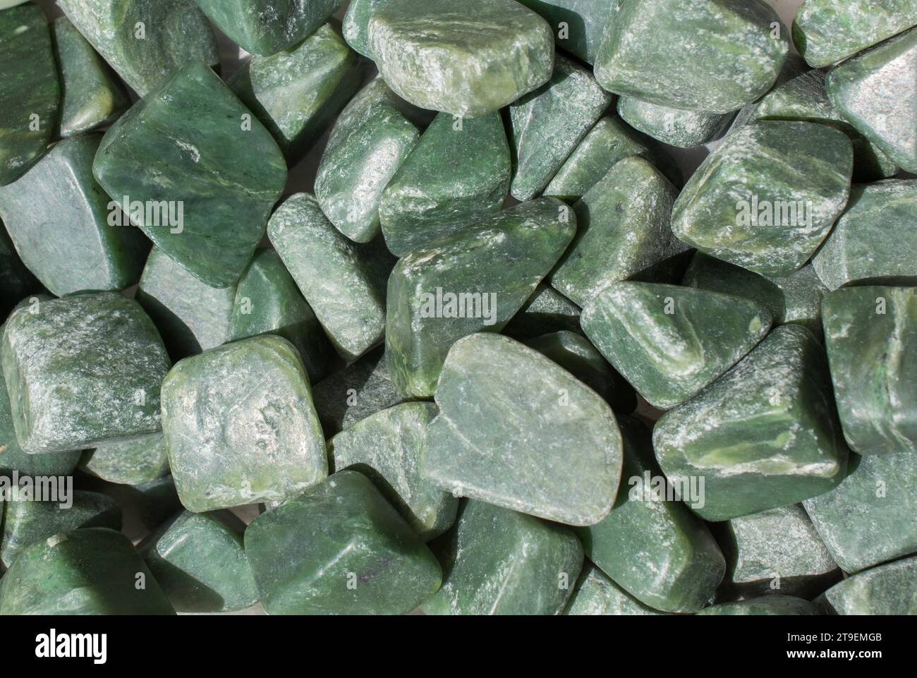 Jade gem stone as natural mineral rock specimen Stock Photo - Alamy