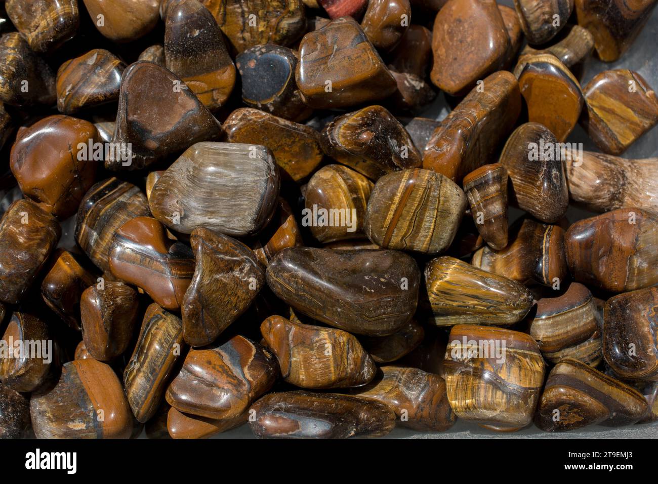Tiger's eye and hawk's eye gemstone as natural mineral rock specimen ...