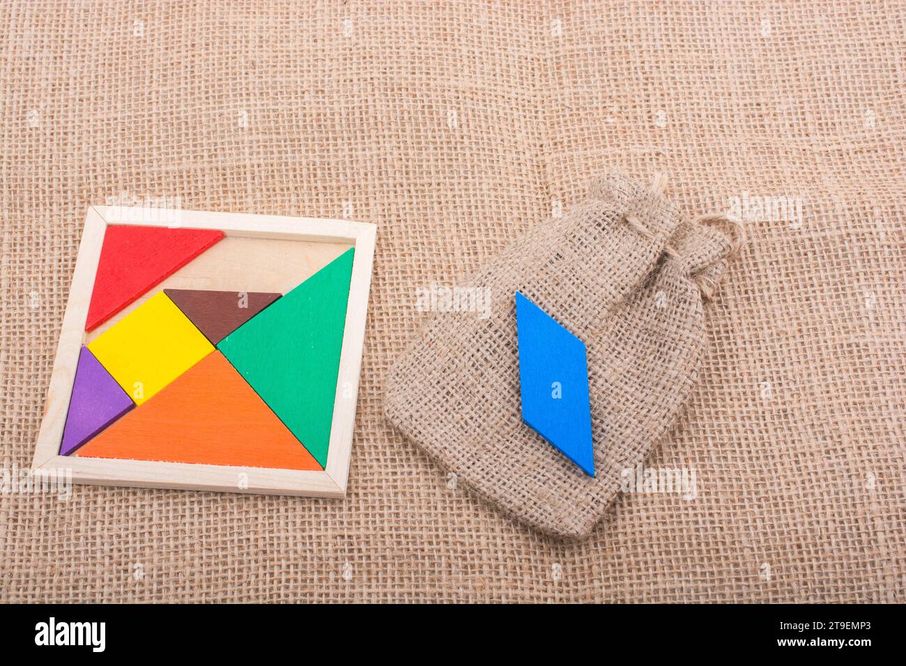 Colorful pieces of a square tangram puzzle Stock Photo - Alamy