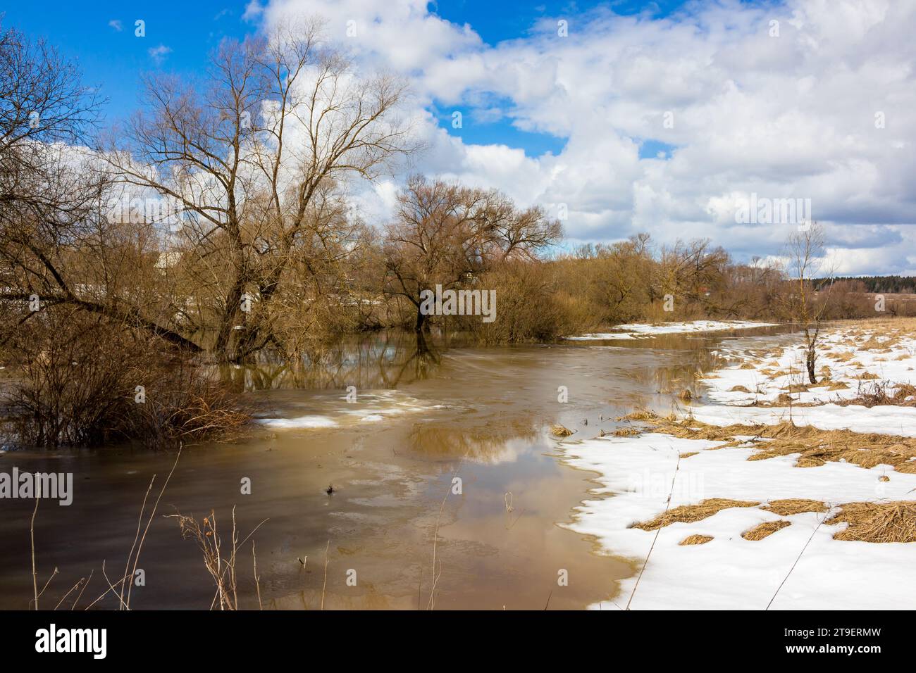 Snow melting in the fields whose meltwater floods the river valley ...