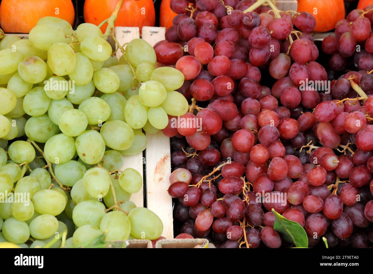 Copenhagen, Denmark /24 November. 2023/Red and green grapes display for ...