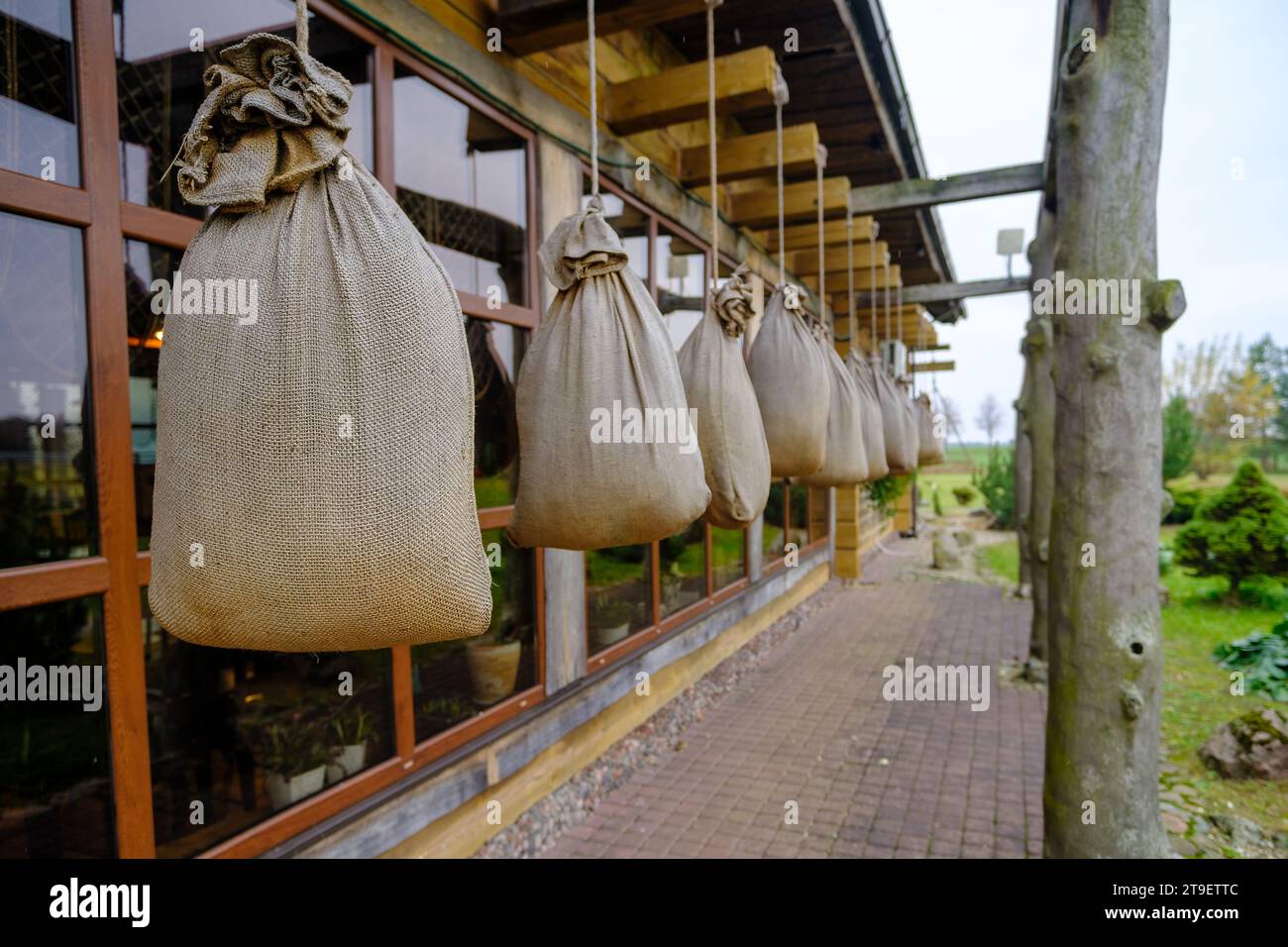 A lot of cloth bags are hung as a decorative element of the building ...