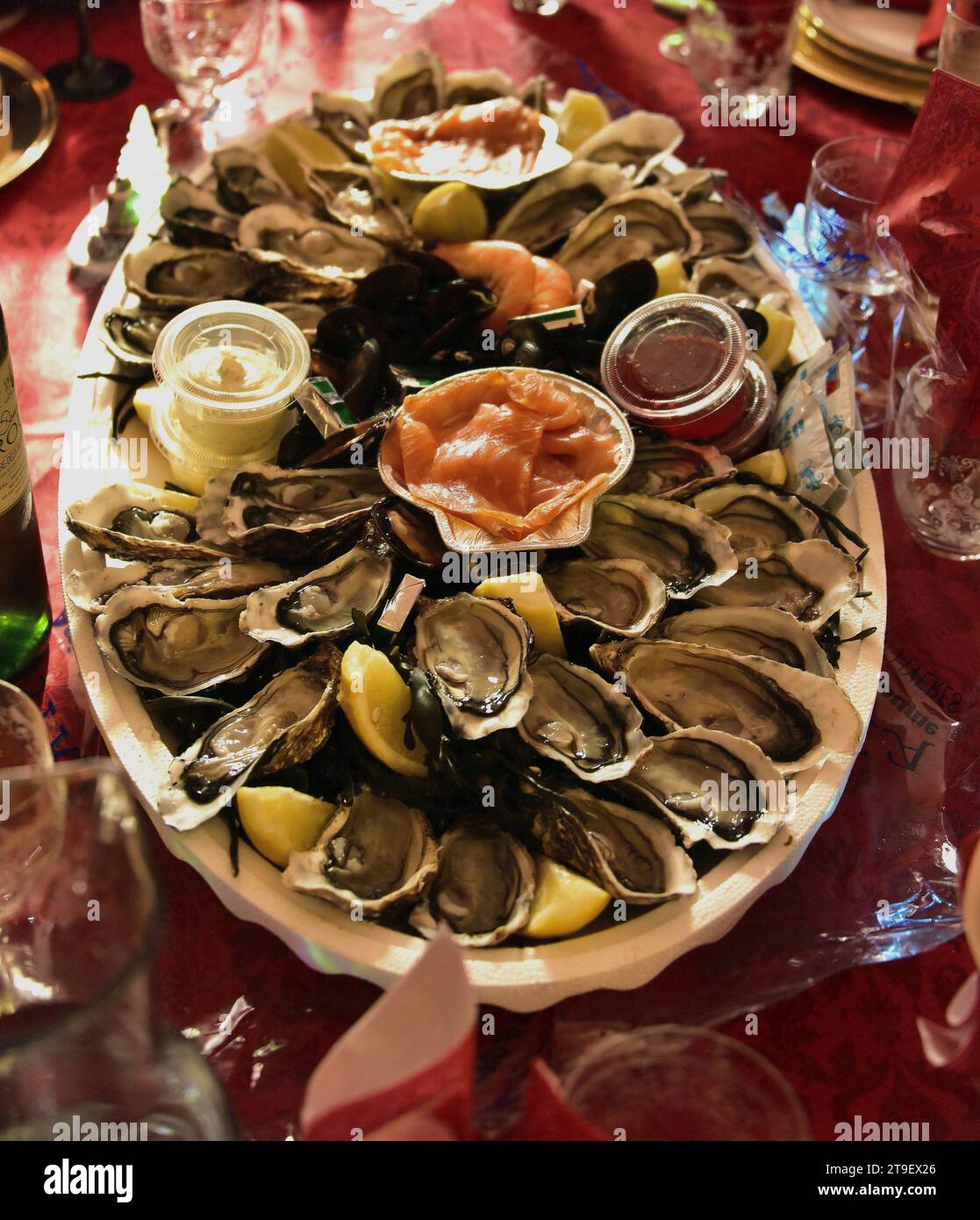 Shell platter. with oysters muscles ursins salmon lemon shallot vinegar ...