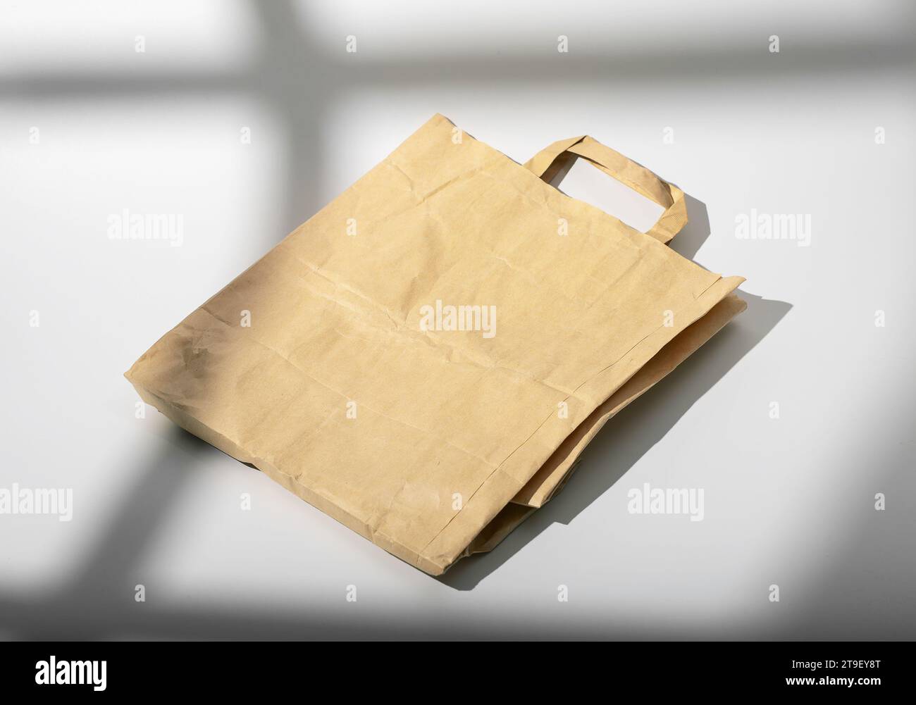 Kraft paper bag, empty brown packet Stock Photo - Alamy