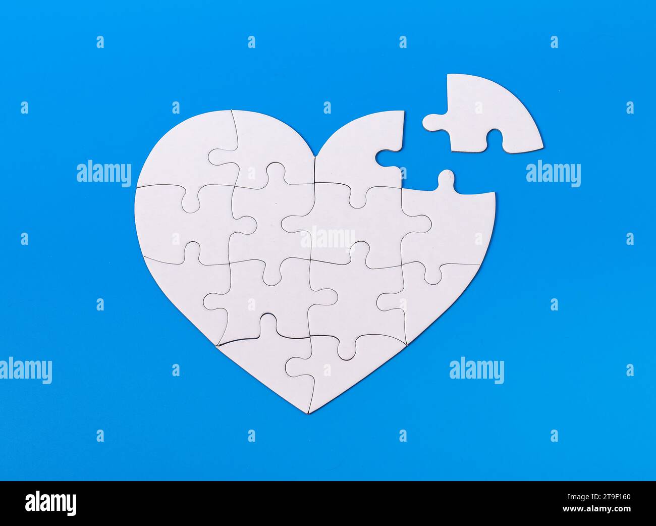 Breaking puzzle heart, missing part, love problem concept Stock Photo ...