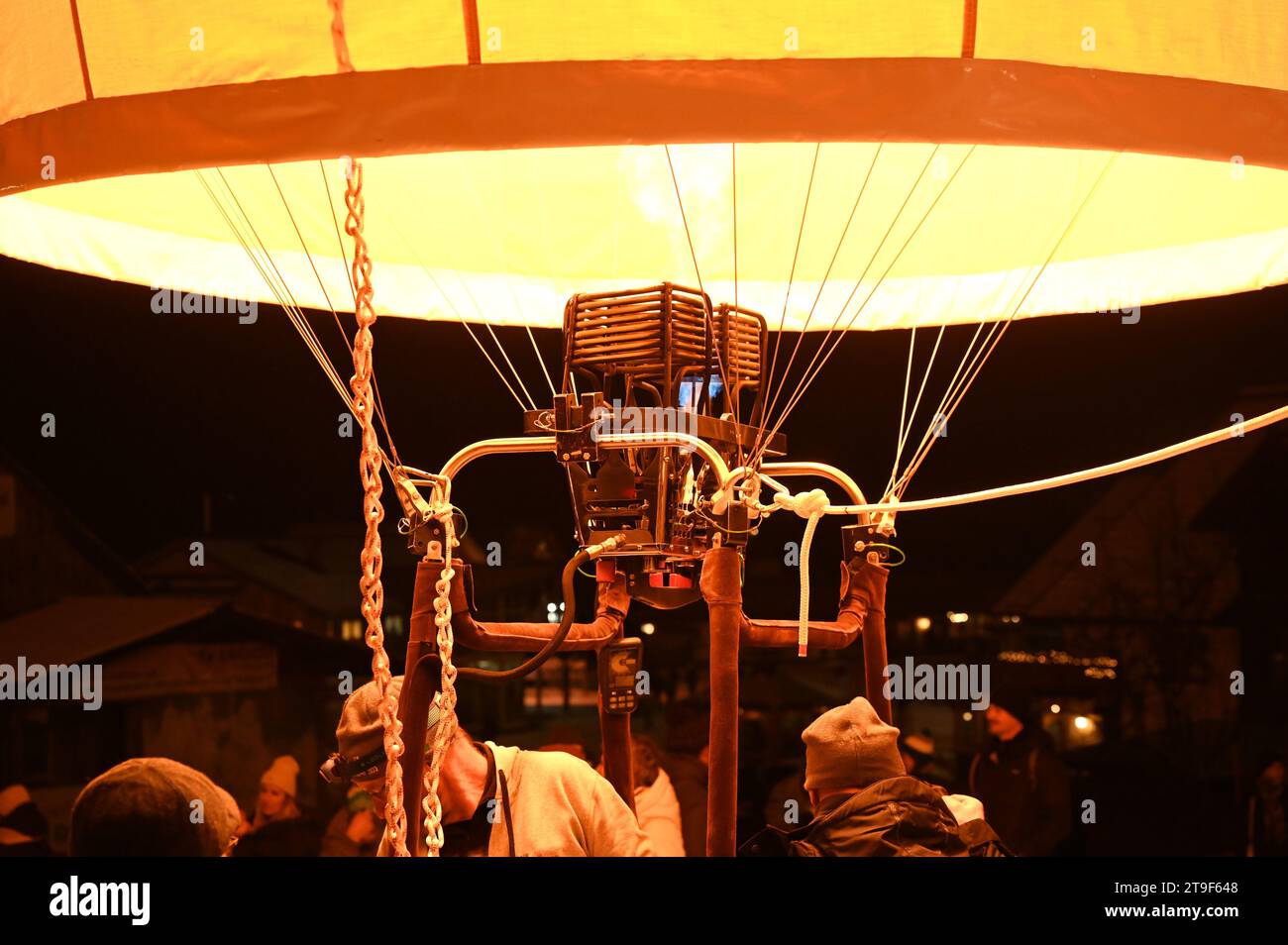 At the night of the balloons, the balloonists fire their balloons on ...