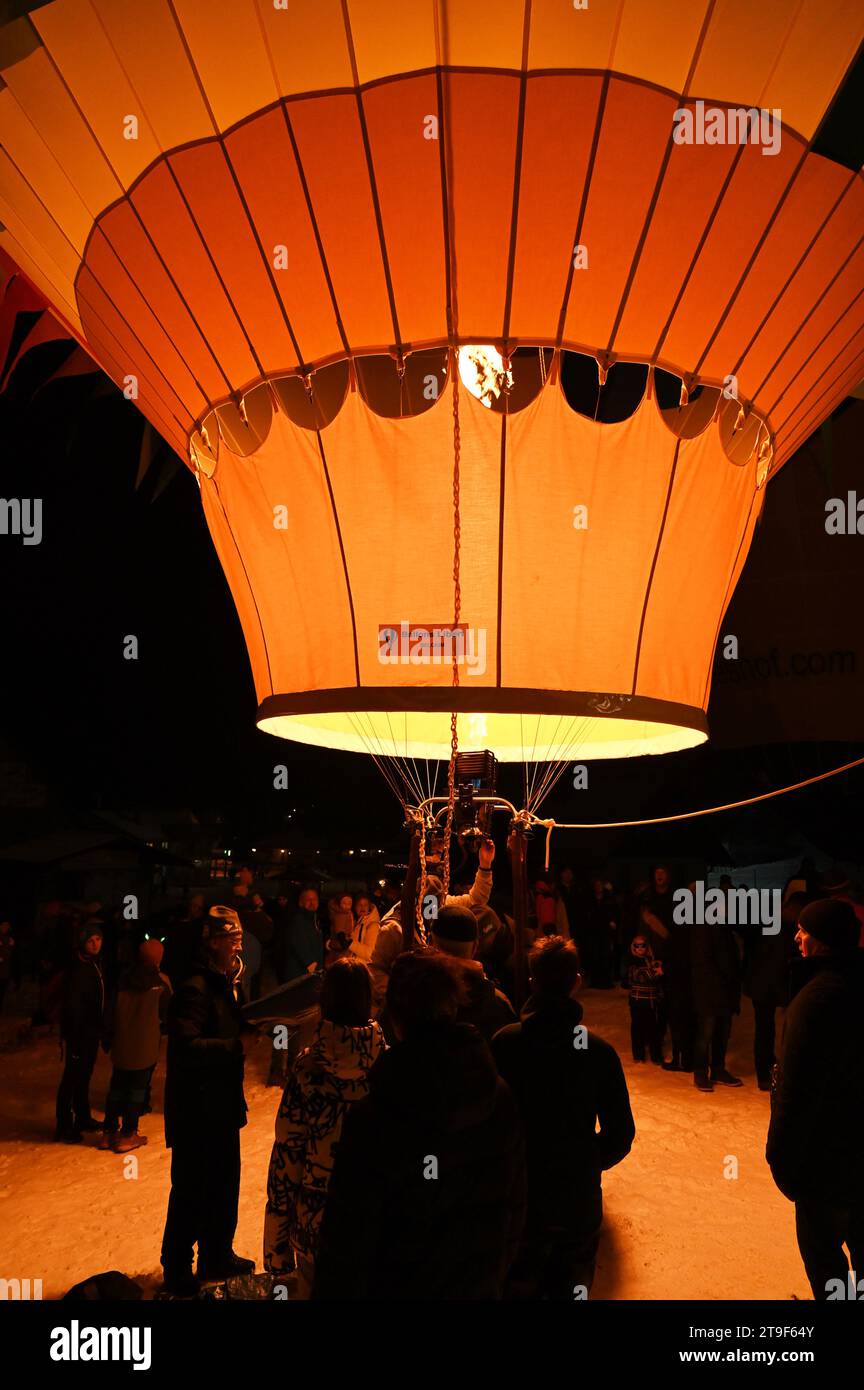 At the night of the balloons, the balloonists fire their balloons on ...