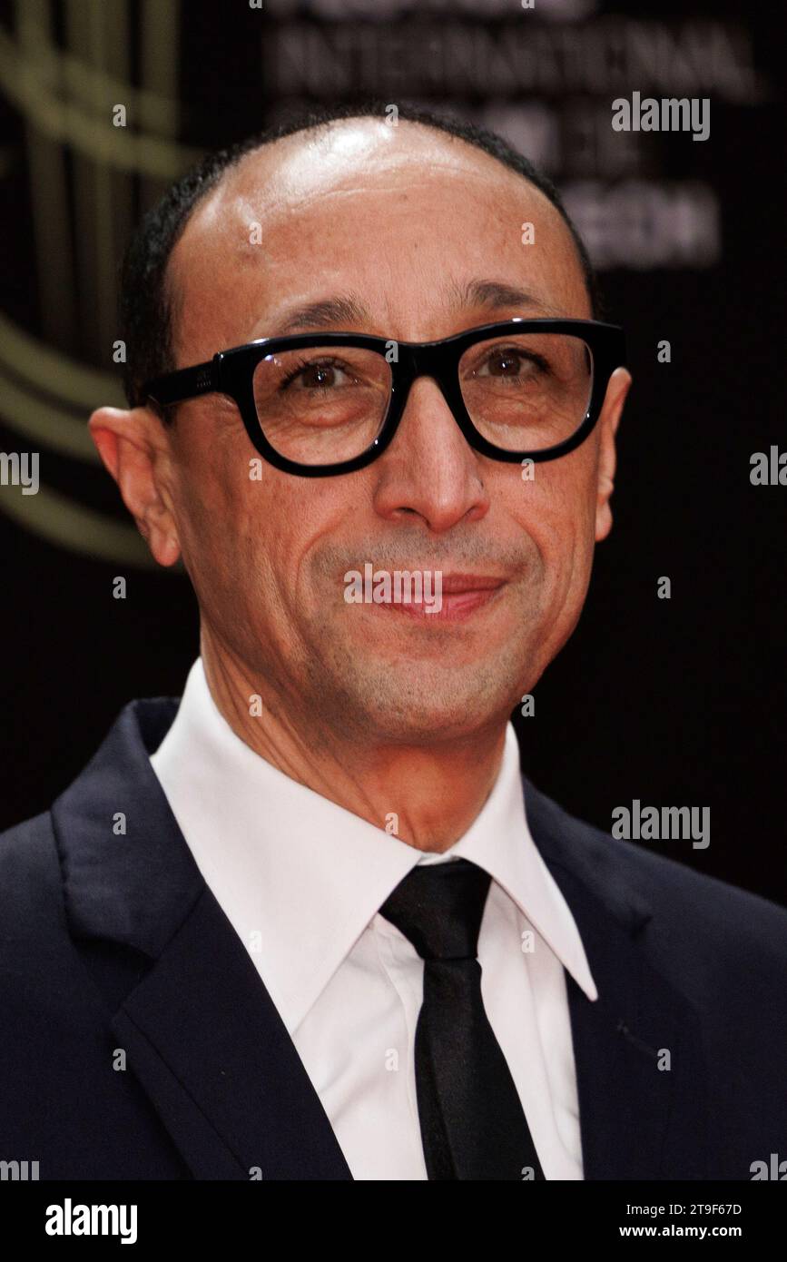 Faouzi Bensaidi poses for photographers before the opening ceremony of ...