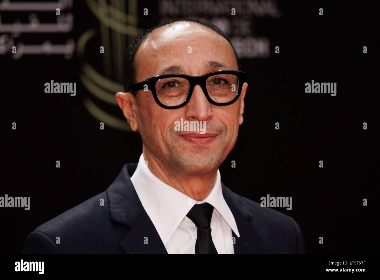 Faouzi Bensaidi poses for photographers before the opening ceremony of ...