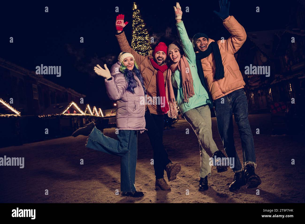 Full size portrait of company excited positive fellows have fun arm ...