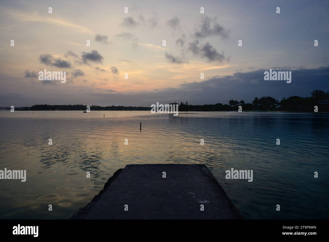 Blue Bay Beach Jetty in Mauritius in the Evening at Dusk at Pointe d ...