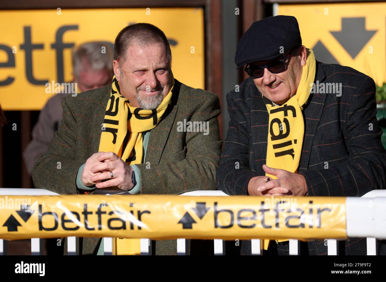 Race goers await the start of racing on Betfair Chase Day at Haydock ...