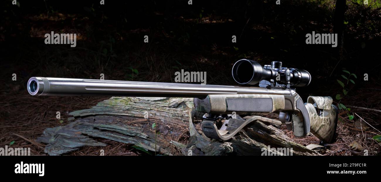 Rifle with a breakdown inline action to run during muzzleloader hunting ...