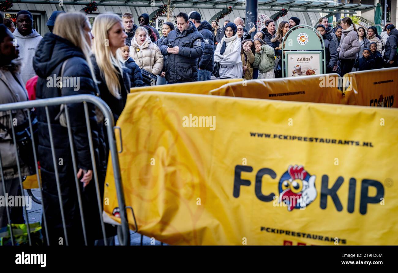 ROTTERDAM - Visitors to Jandino Asporaat's FC Kip restaurant wait in ...