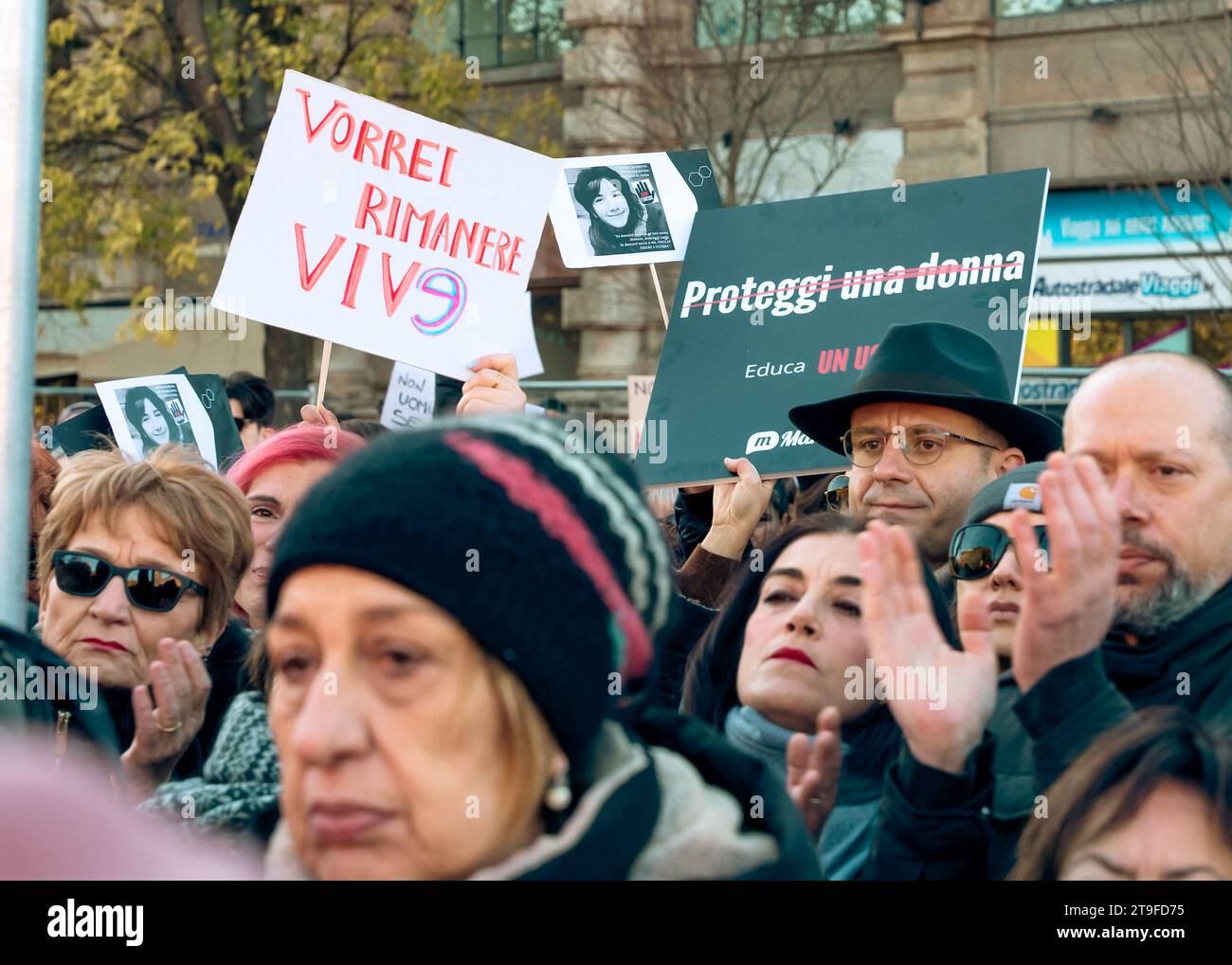 Demonstration in Milan against violence against women, with thousands of women and men Stock ...