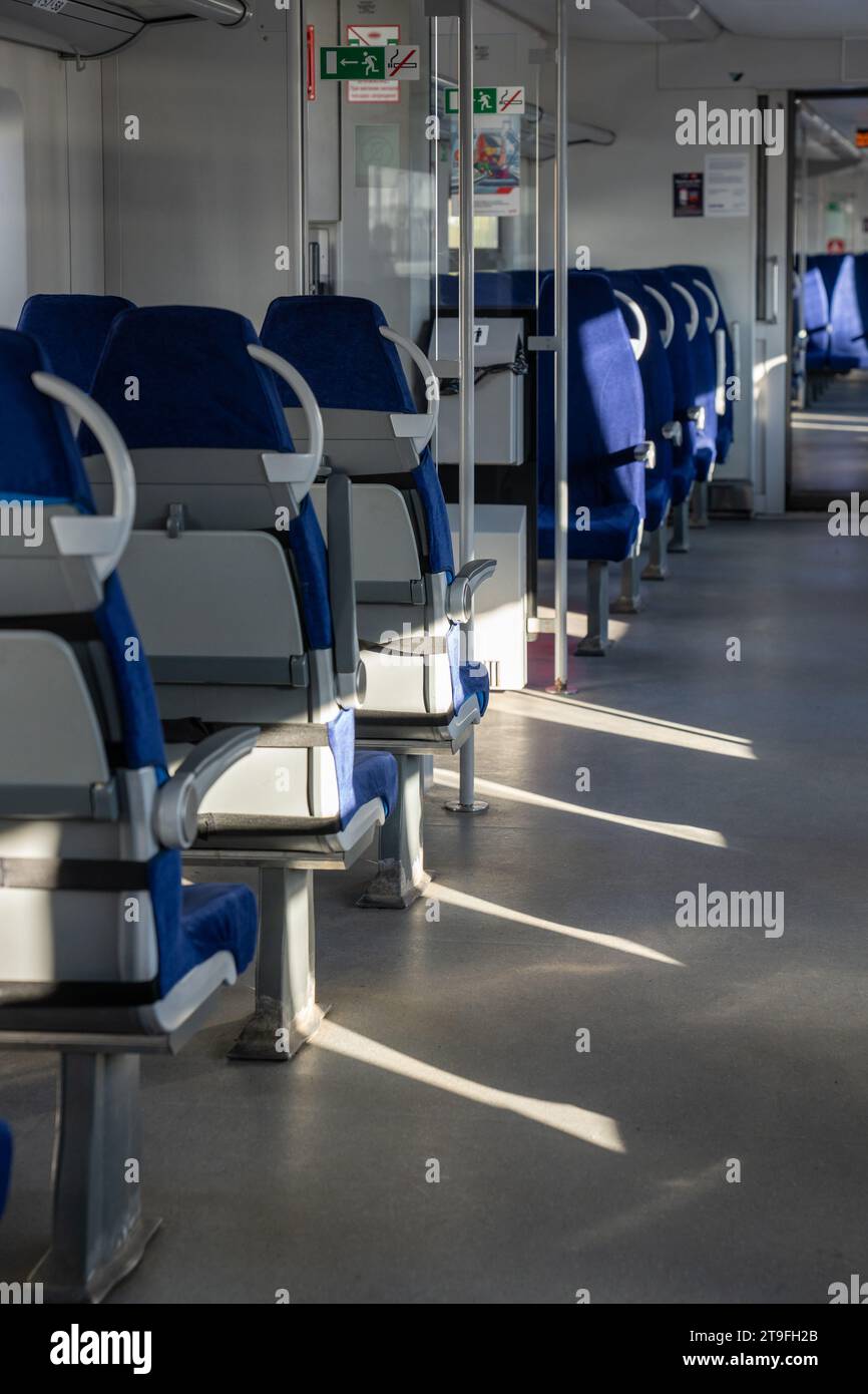 Interior of modern passenger high-speed express train. Inside the train ...