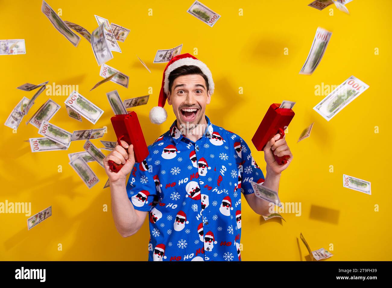 Photo of funky astonished wealthy man hold money gun shoot bills ...