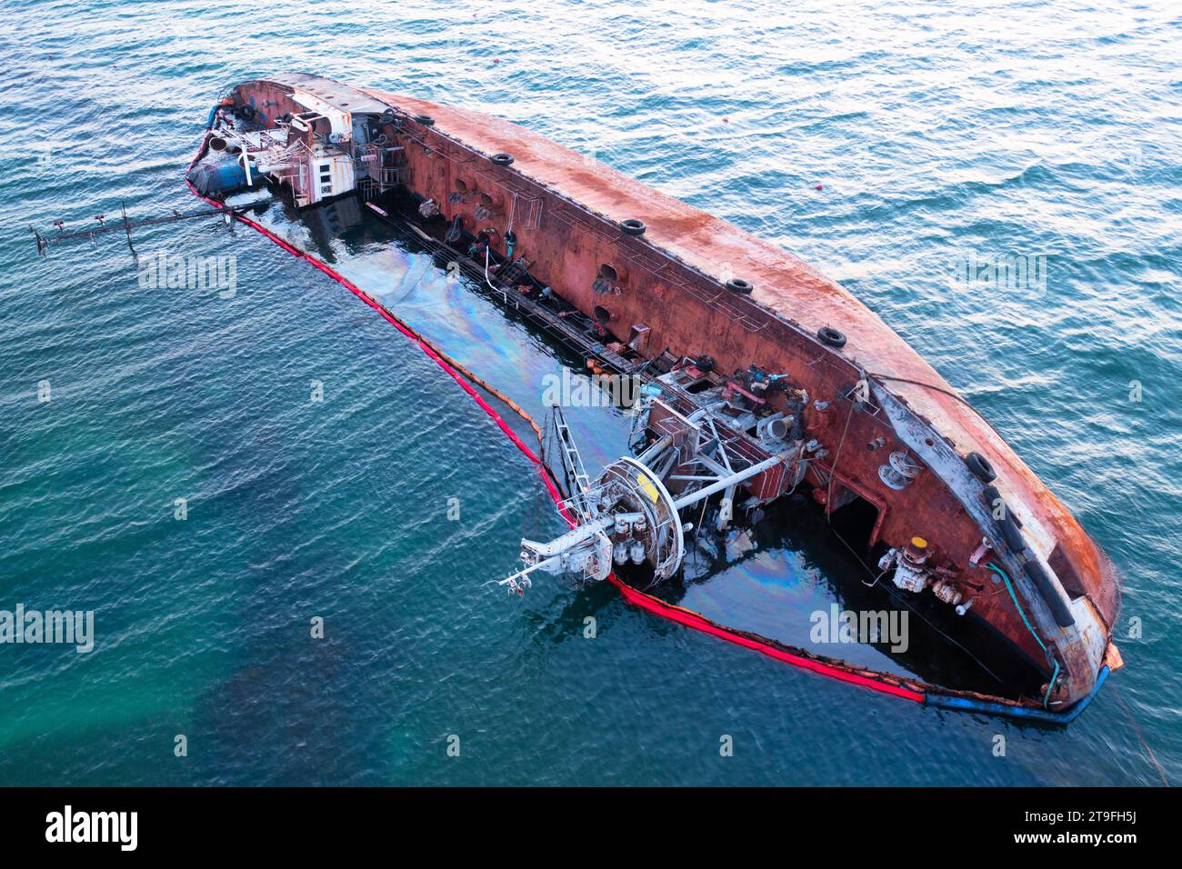 Ocean's Fury: Tanker Overturned, a Victim of Nature's Rage Stock Photo ...