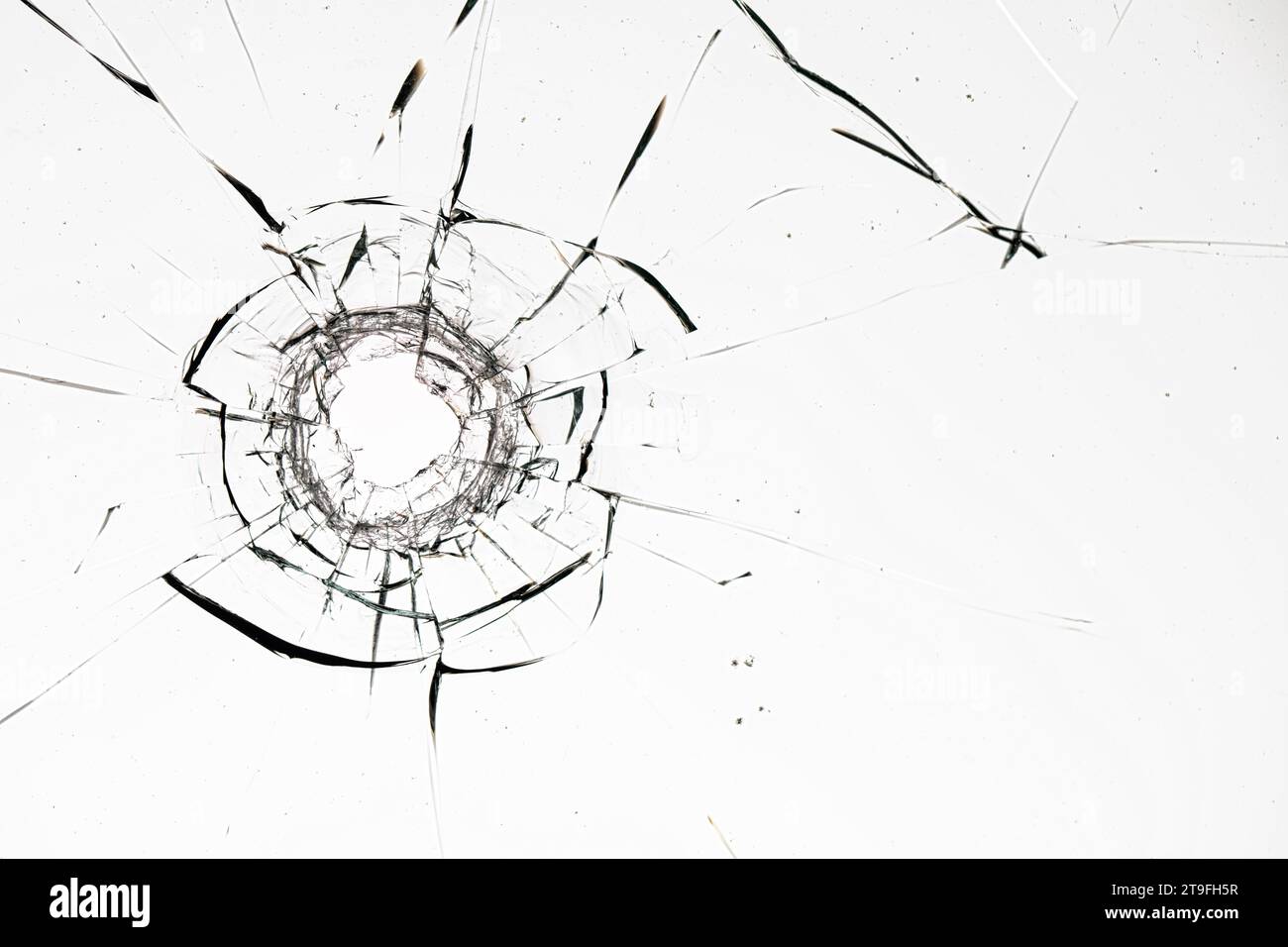 Beyond Impact: The Visual Poetry of a Bullet Through Glass Stock Photo ...