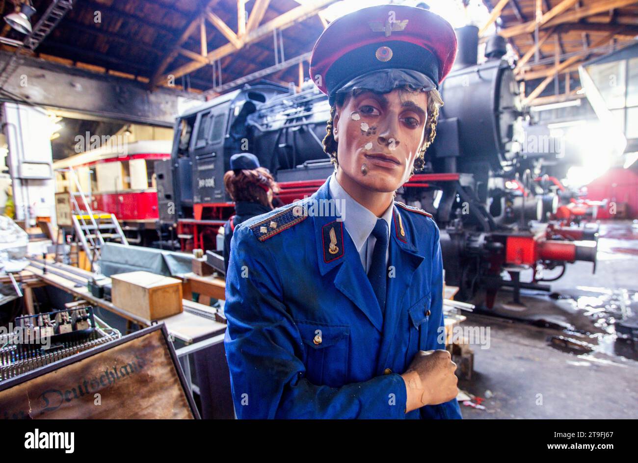 Schwerin, Germany. 25th Nov, 2023. A mannequin with a GDR Reichsbahn uniform, damaged in the ...