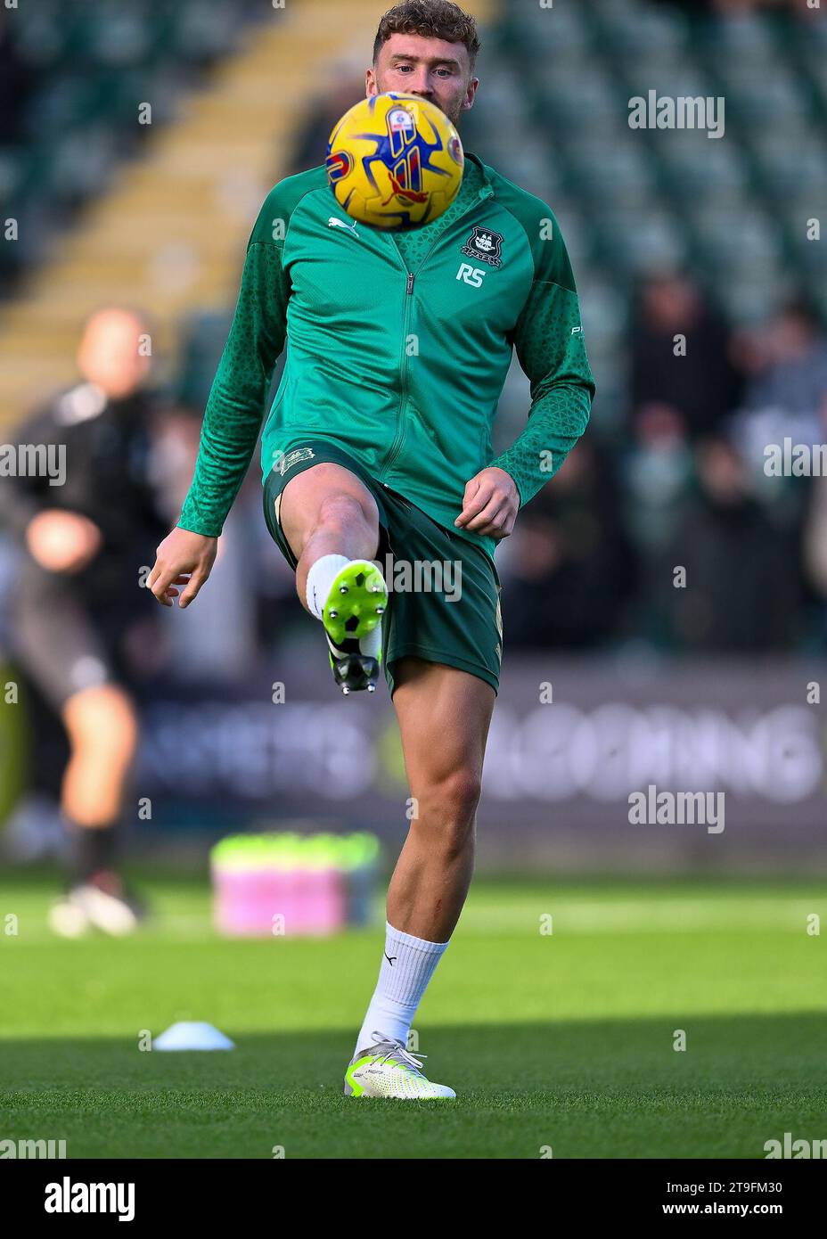 Dan Scarr #6 of Plymouth Argyle warming up during the Sky Bet ...
