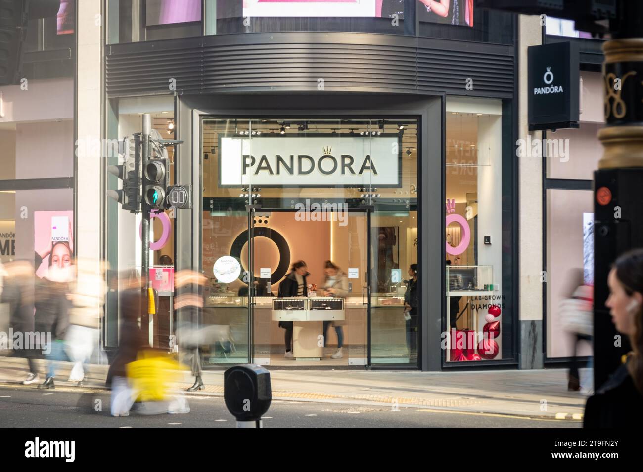 LONDON- NOVEMBER 23, 2023: Pandora fashion jewellery shop and motion ...
