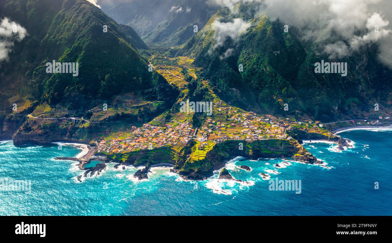Aerial view of Madeira island. Land meets ocean in Seixal, Madeira ...