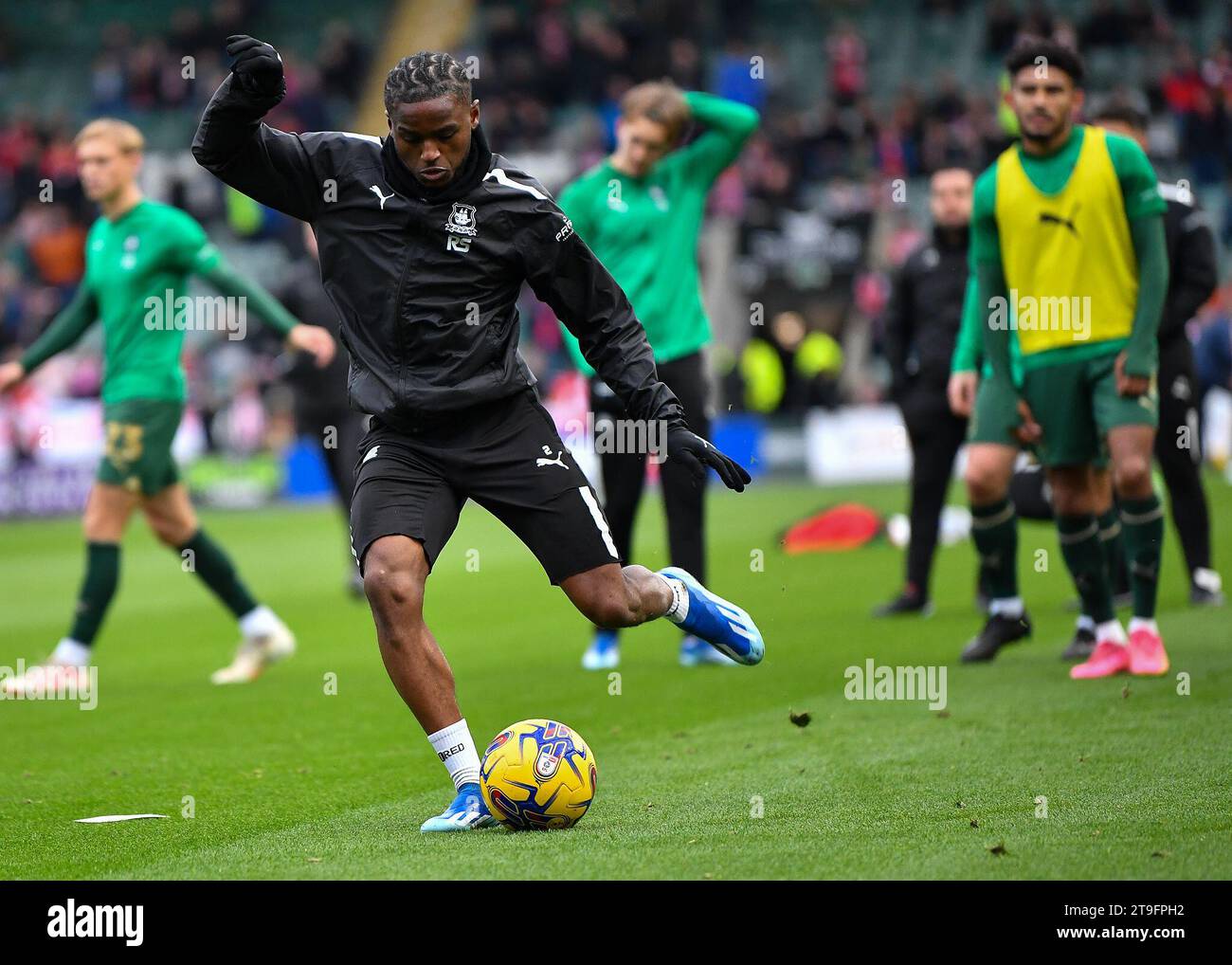 Bali Mumba #2 of Plymouth Argyle warming up during the Sky Bet ...