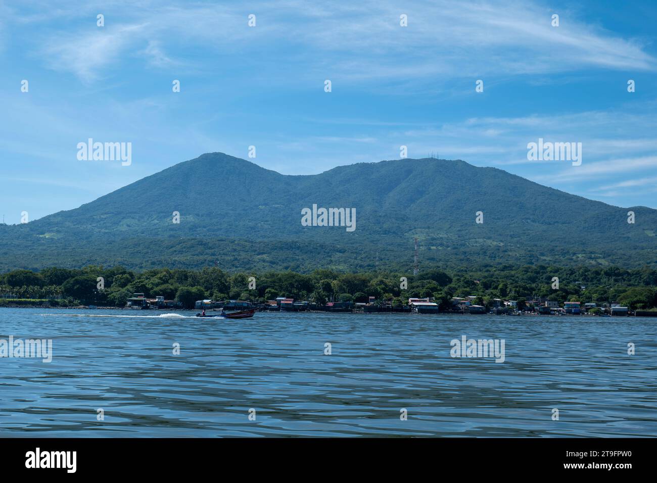 Coastline Seen From Afar with a Volcanic Mountain, Lush Vegetation ...