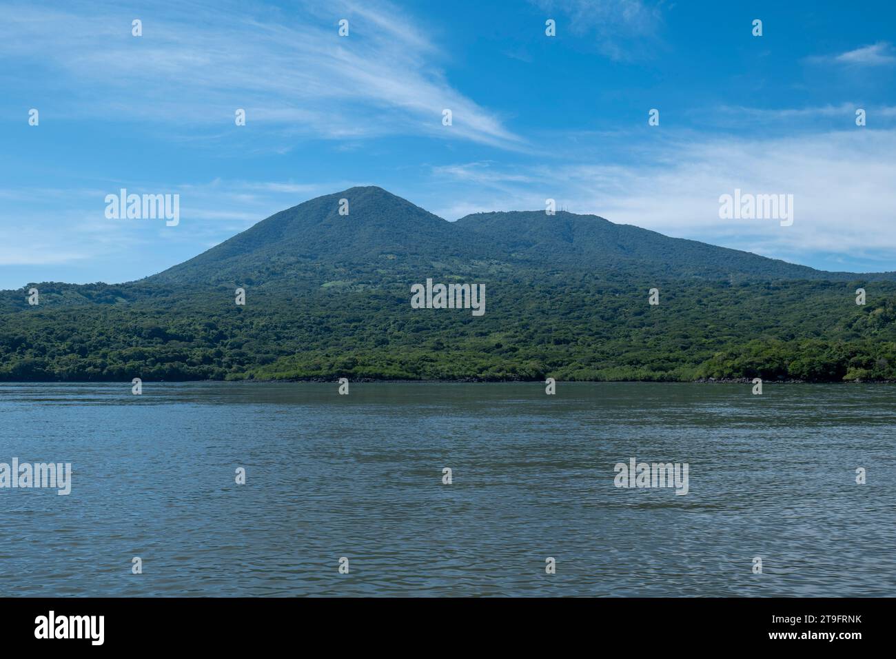 Coastline Seen From Afar with Huge Volcanic Mountain with Lush ...