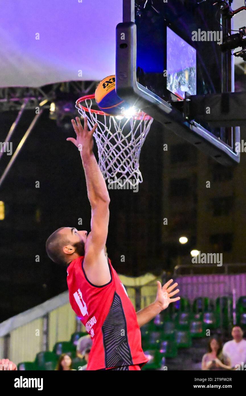 Hong Kong, China. 25th Nov, 2023. Milos Milovanovic of Hangzhou goes ...