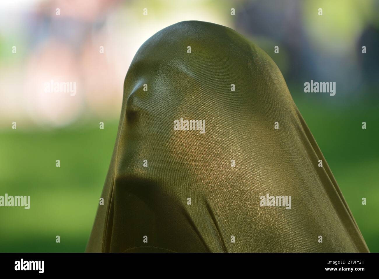 The man's face is covered with cloth. Masked man Stock Photo - Alamy