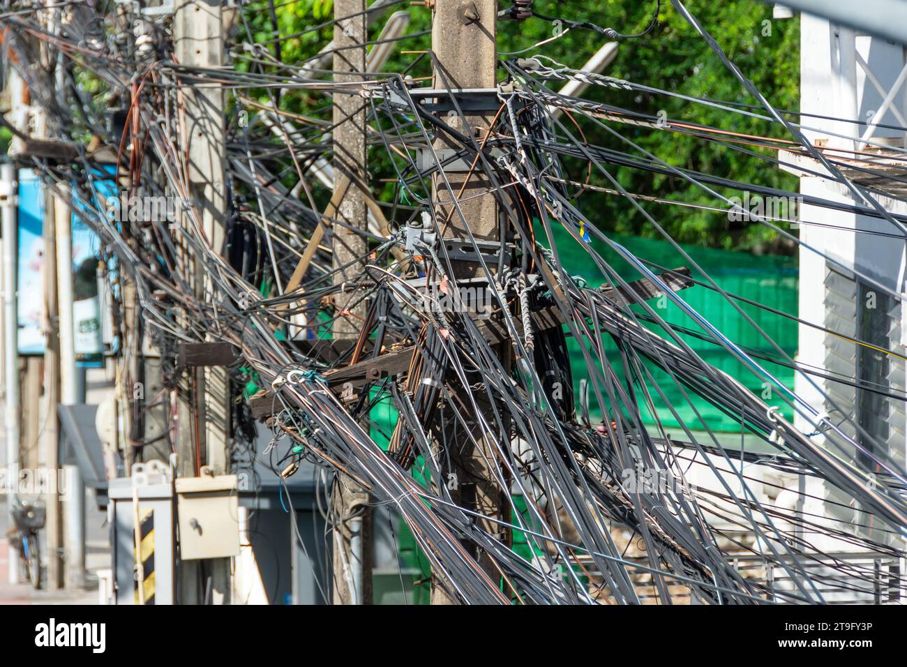 Electricity post with many wires and cables in wound various wires ...
