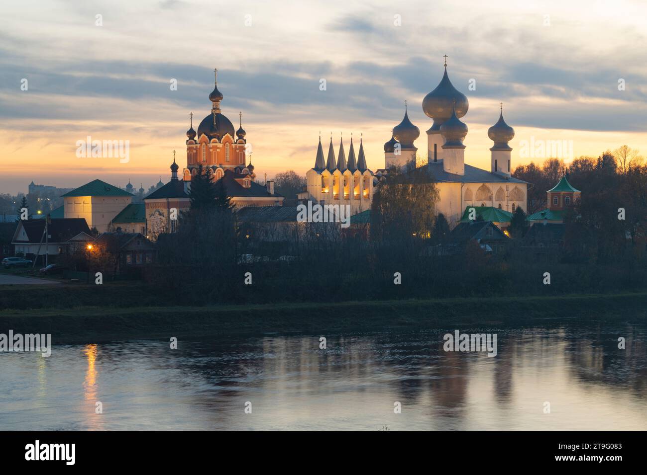 Tikhvinka River and the ancient Tikhvin Assumption Monastery in October ...