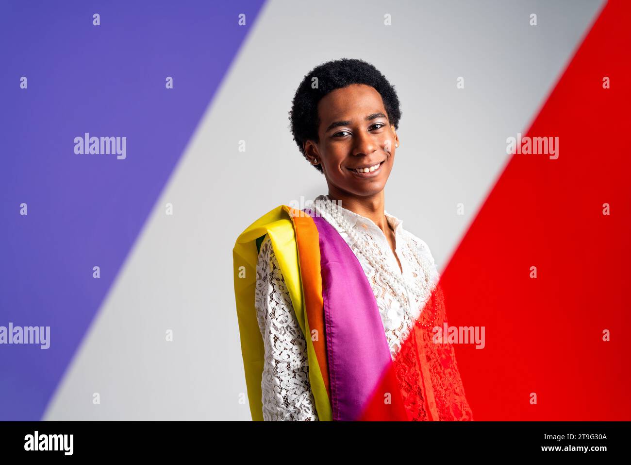 Fluid gender hispanic latin black man posing in studio with fashionable ...