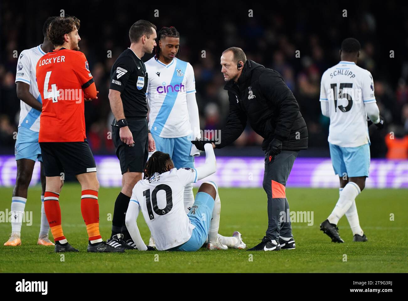 Crystal Palace's Eberechi Eze is assessed before leaving the game with ...
