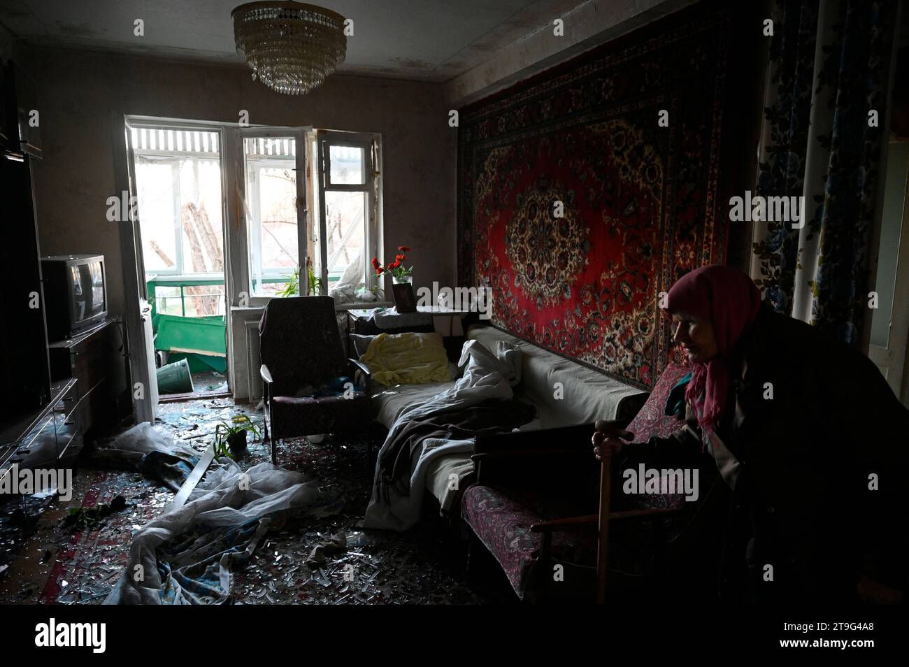 Kyiv, Ukraine. 25th Nov, 2023. An elderly woman in her partially ...