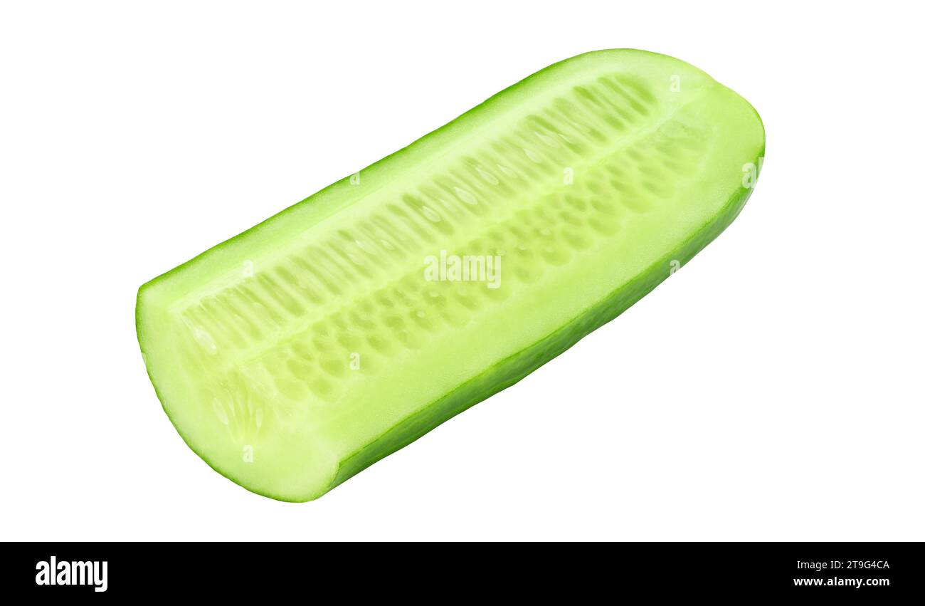 Cucumber cut lengthwise into a piece isolated on a white background ...