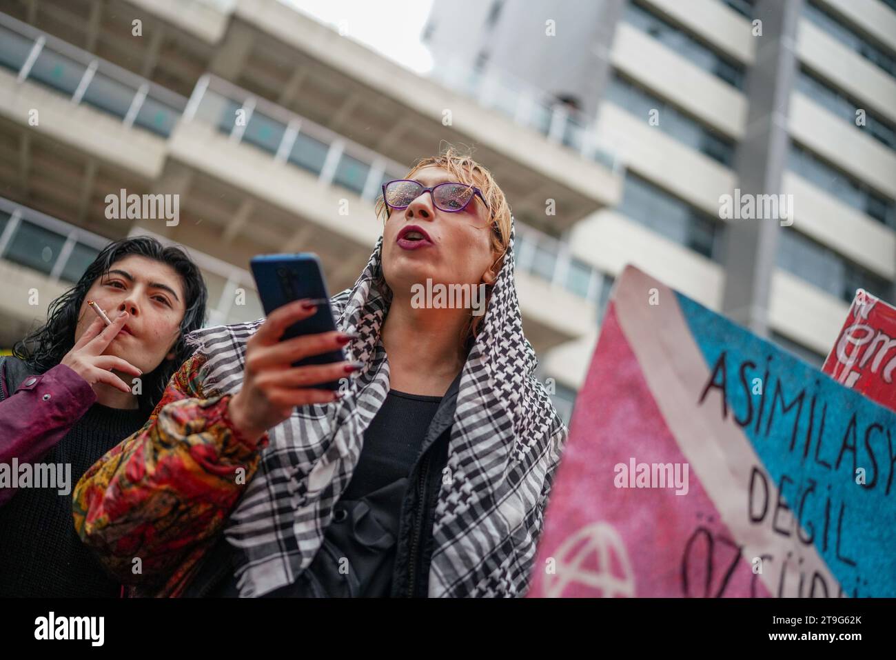Ankara, Turkey. 25th Nov, 2023. A transgender woman chants slogans ...
