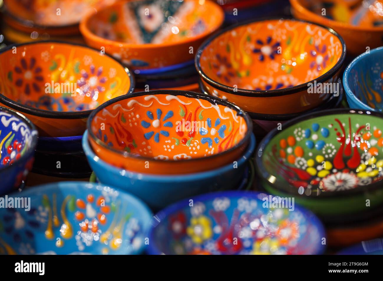 Bowls painted multi colored, with Turkish patterns, selective focus ...