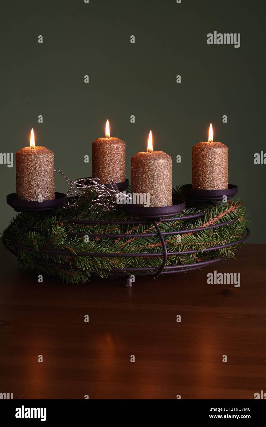 Advent wreath with four golden burning candles. (CTK Photo/Petr Malina ...