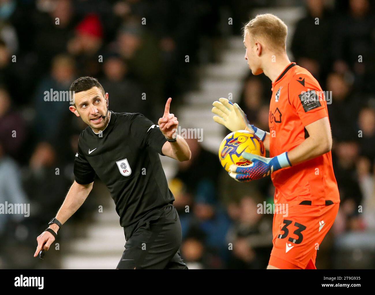 Bristol City goalkeeper Matthew Aidan Cox (right) speaks with referee ...