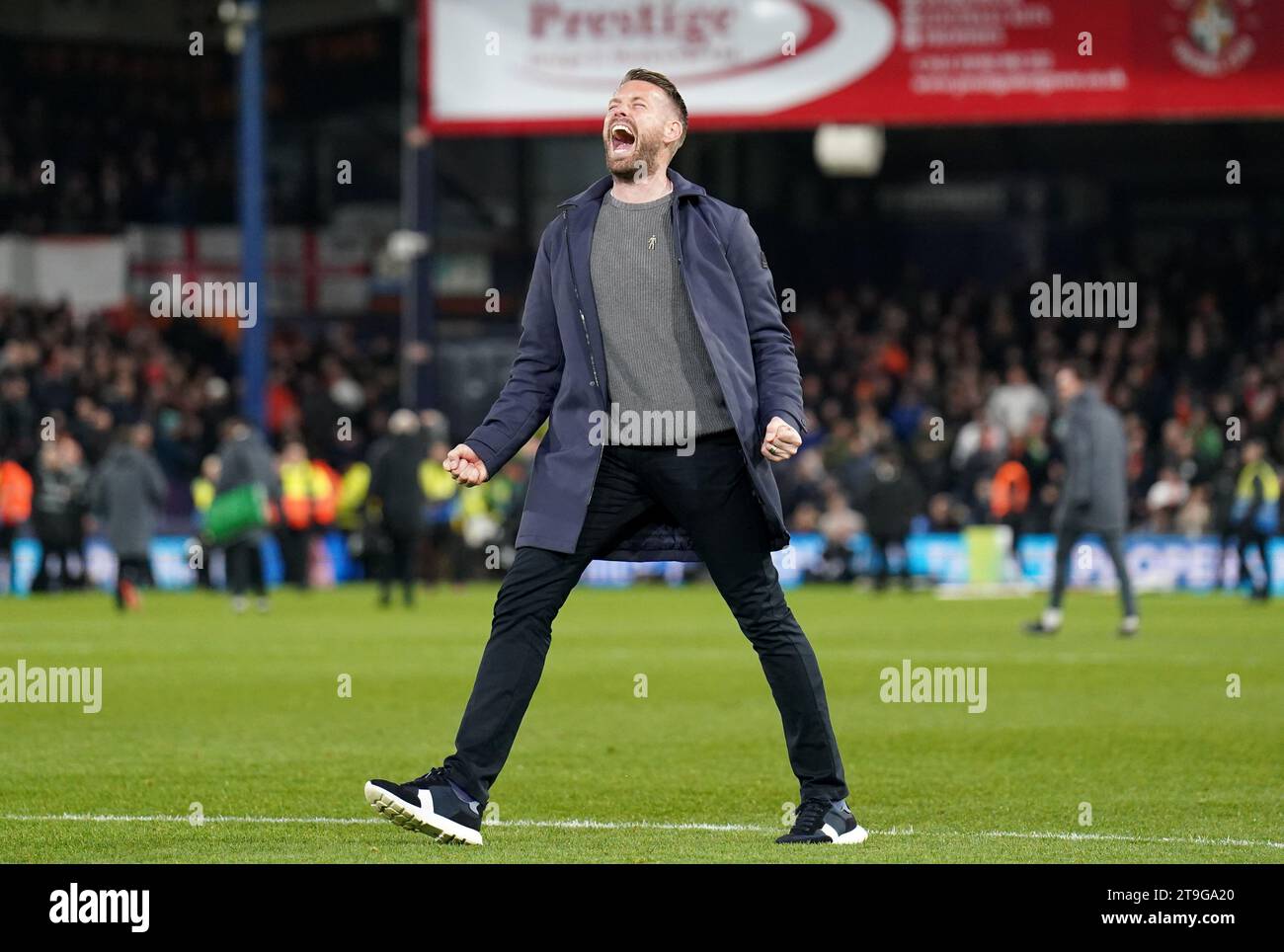 Luton Town manager Rob Edwards celebrates the win after the Premier ...