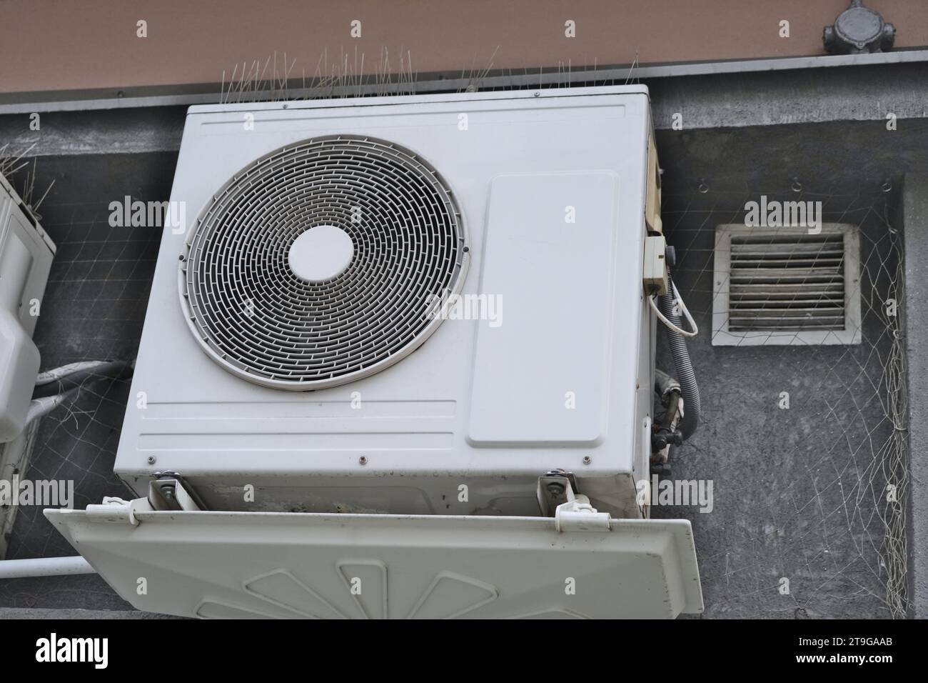 Large white old city air conditioner made of white aluminum sheet ...