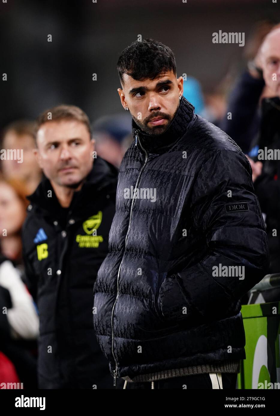 Arsenal's on loan goalkeeper David Raya looks on from the dugout the ...