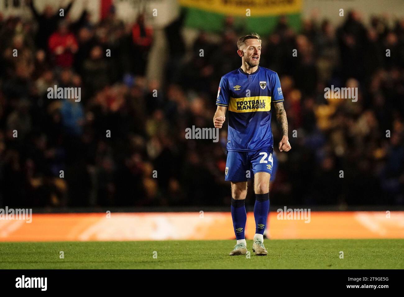 AFC Wimbledon's Charlie Lakin celebrates at the end of the Sky Bet ...