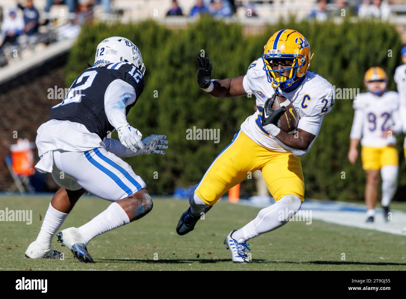 Pittsburgh's C'Bo Flemister (24) carries the ball as Duke's Tre Freeman ...