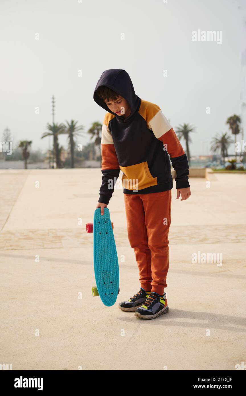 Vertical full length portrait of a multi ethnic teenager, stylish ... Vertical full length portrait of a multi ethnic teenager, stylish ...