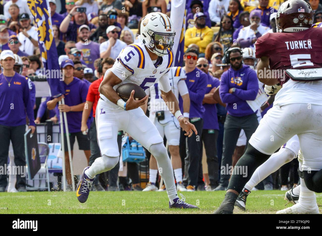 November 25, 2023: LSU quarterback Jayden Daniels (5) runs out of the ...